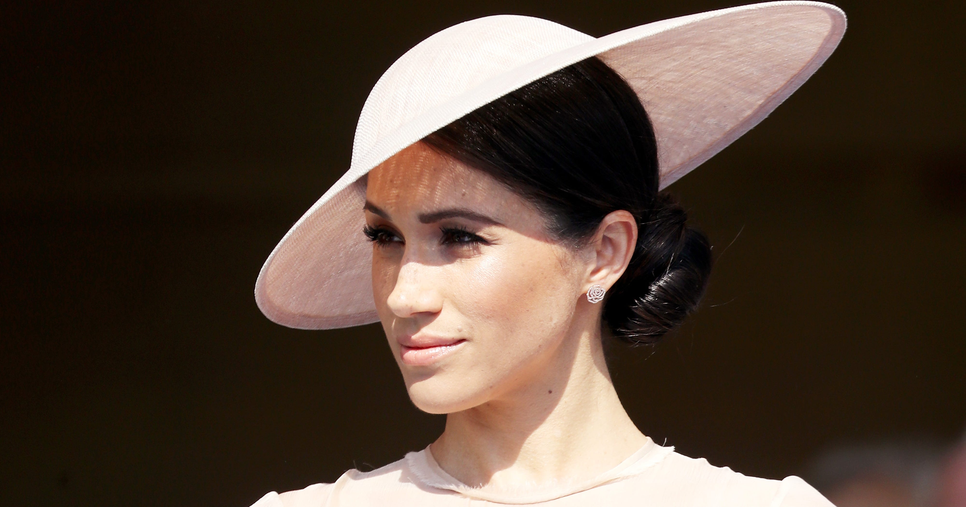 Meghan Markle Swaps Her Messy Bun For A Sleek Chignon